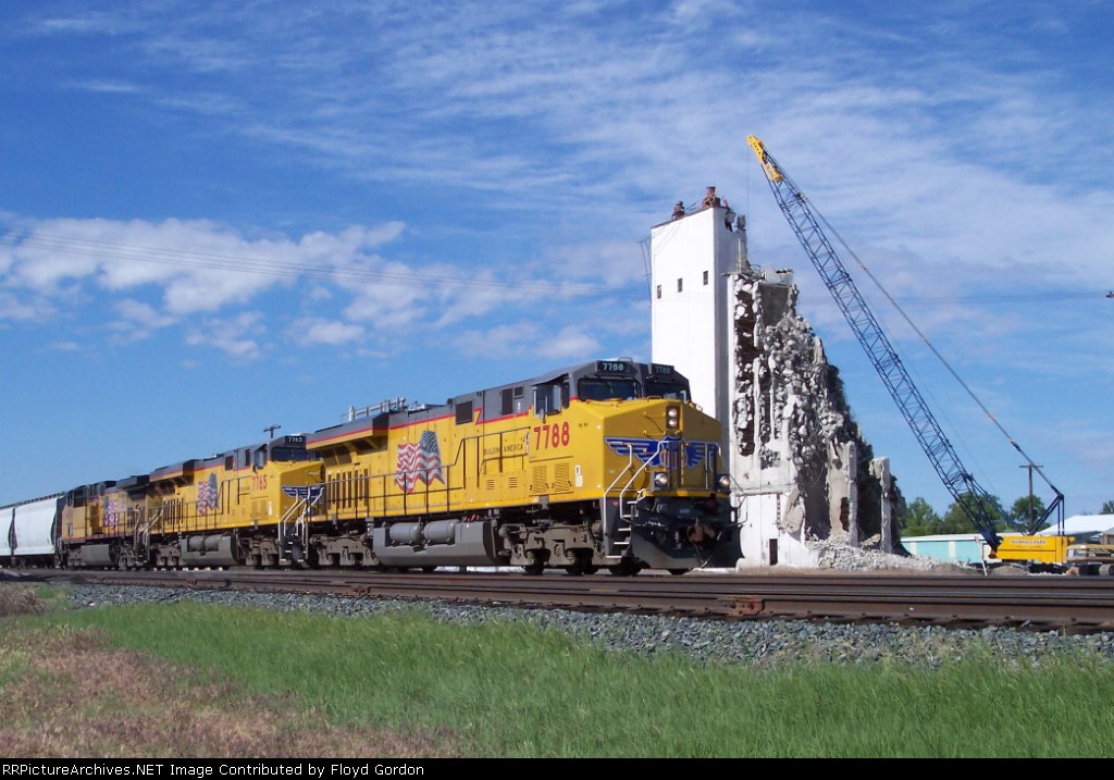 UP 7788 passes old elevator
